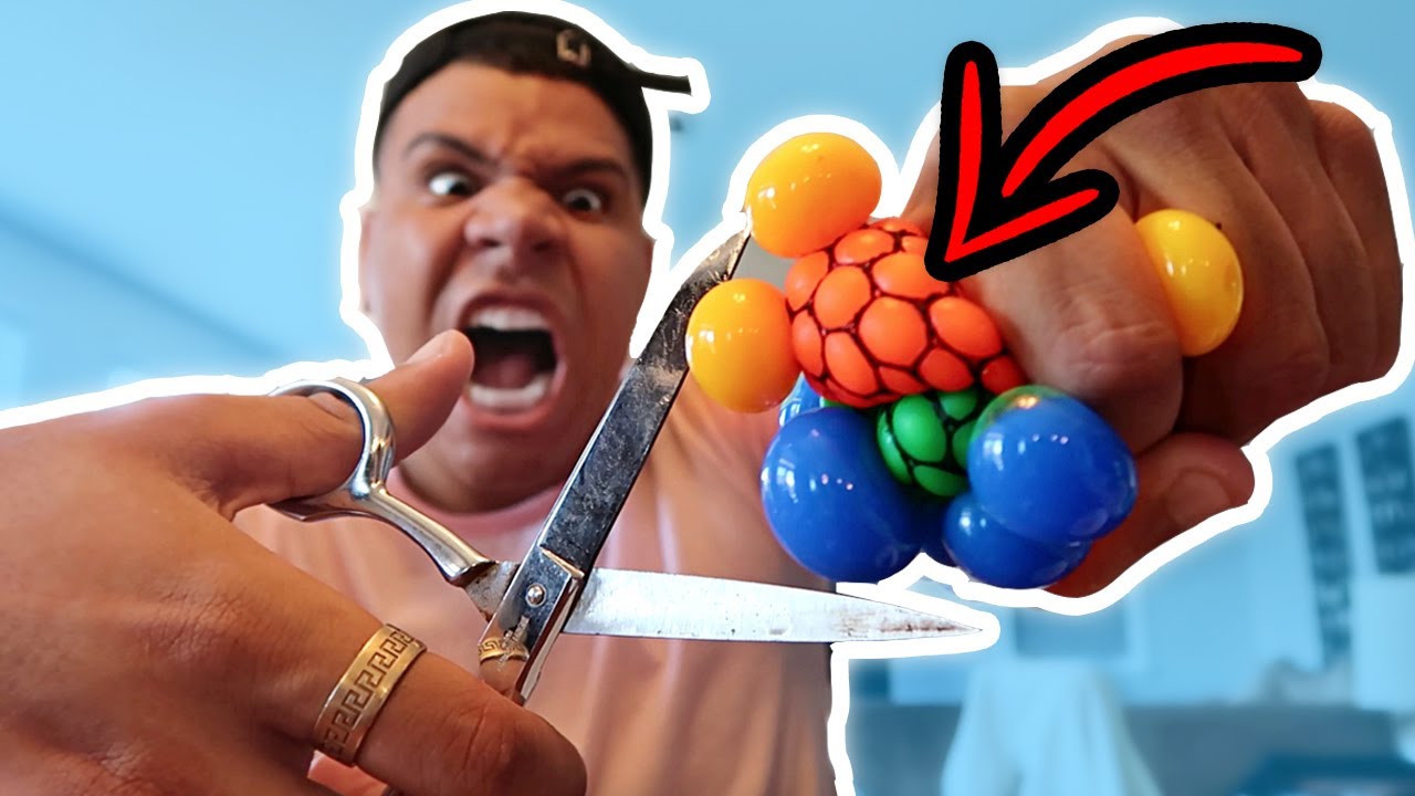 CUTTING OPEN GIANT STRESS BALLS!! (WHAT'S INSIDE) - YouTube