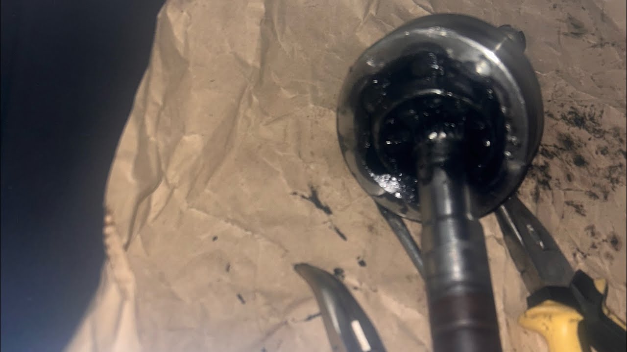 How to remove CV axle retainer clip - YouTube