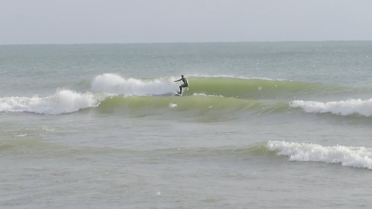 2022.11.19 snowy clean waves in wisconsin, great lakes surfing - YouTube