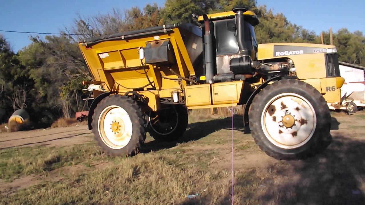 AE0382 2005 Rogator 1264 dry spinner spreader - YouTube