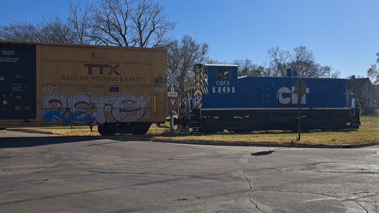 SW locomotive shunting boxcars across 120 year old rickety rails - YouTube