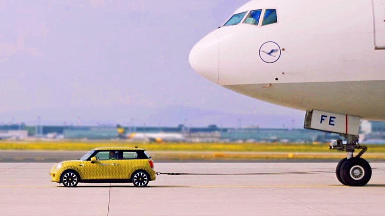 MINI Cooper S Electric pulls 150-Tons Boeing aircraft - YouTube
