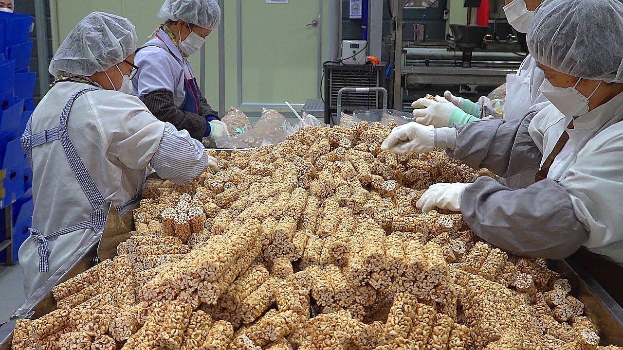 Process of mass production of Korean traditional sweets. Confectionery ...