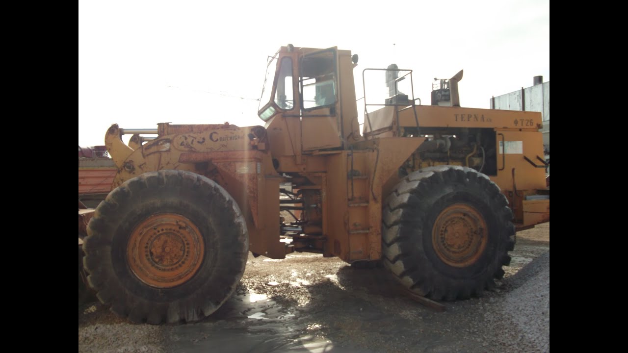 MICHIGAN 275C loading a 10 ton container (fast forward). - YouTube