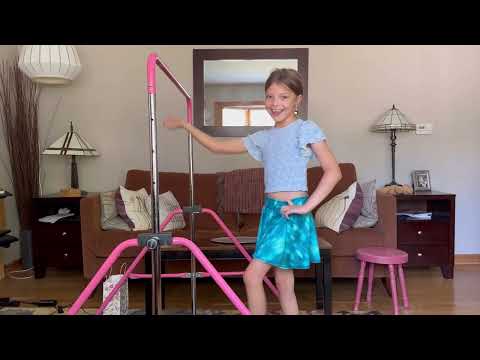 Girl gymnastics! At home! Kid fun! Learn gymnastics! On a bar!
