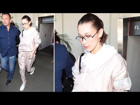 Supermodel Bella Hadid Signs Autographs At LAX - YouTube