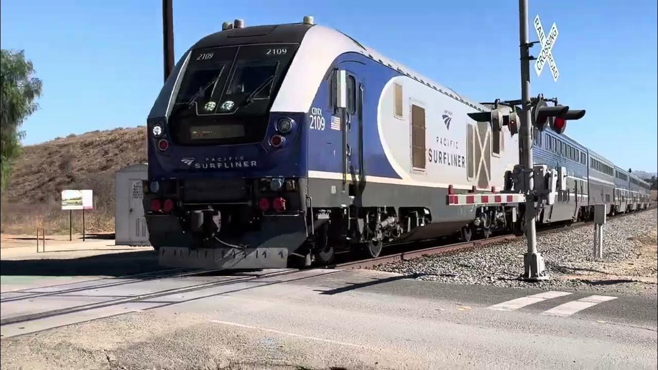 Amtrak Pacific Surfliner CDTX 2109 passes through a railroad crossing at Moor Park California ...