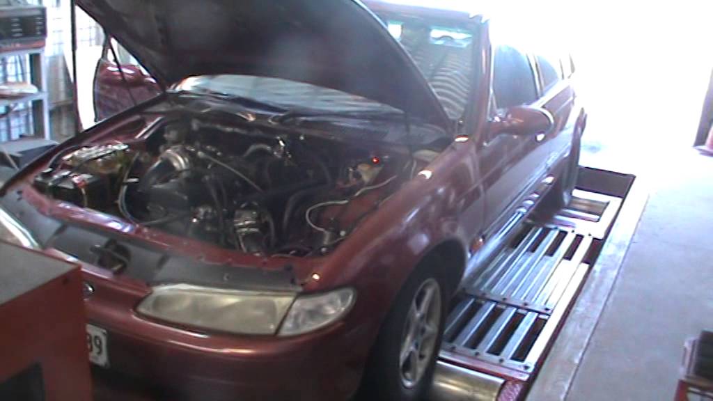 Spoolinboosts turbo ef falcon on the dyno lifting the head at 430rwkw ...