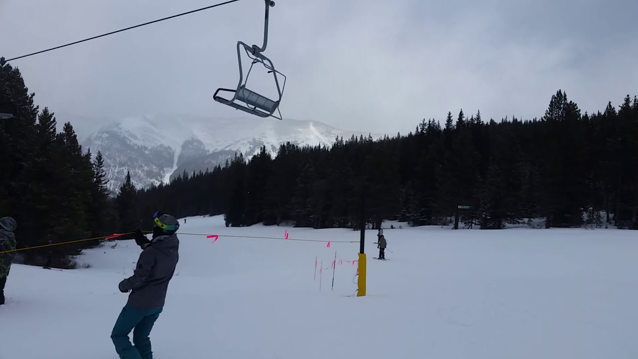 Kid Dangling from Chair Lift Doesn't Make It! - YouTube