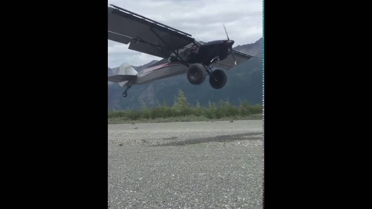Alaska vertical plane landing in strong winds - YouTube
