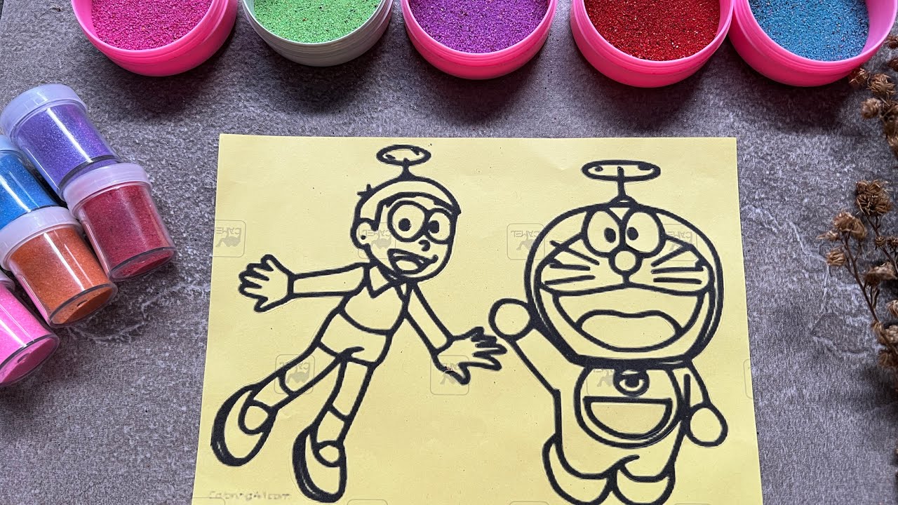 SAND PAINTED COLORED DORAEMON AND NOBITA WITH THE TAKE COPTER (MAGIC ...