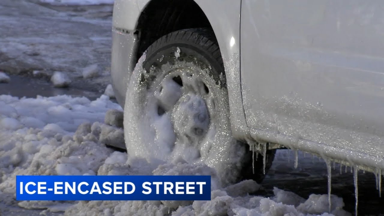 'I can't get out': Water main leak causes parts of neighborhood to ice ...