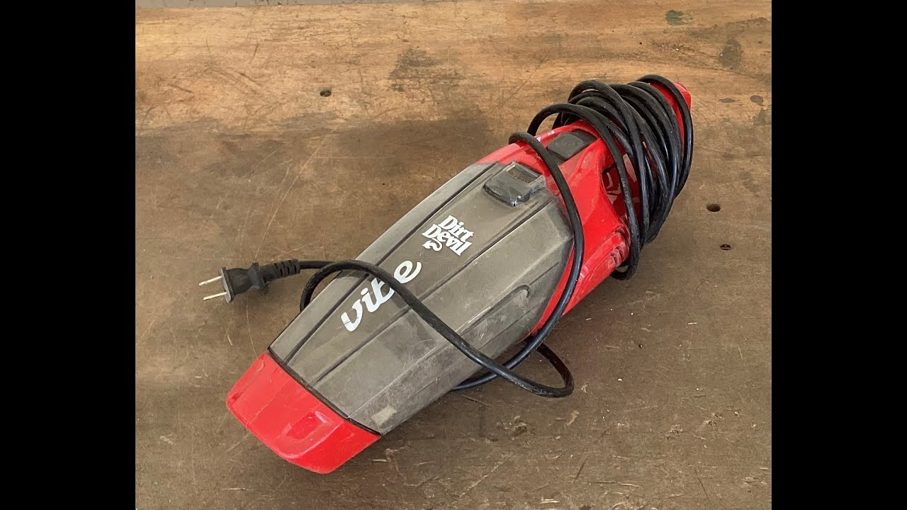 Scrapping a small handheld vacuum cleaner for copper, tin, and other ...
