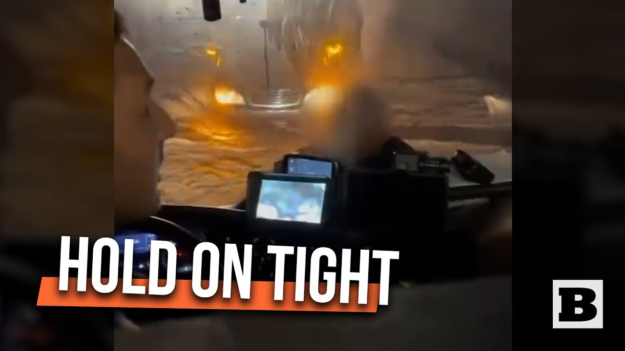 SCARY: Man Holds on for DEAR LIFE During Madrid Flood - YouTube