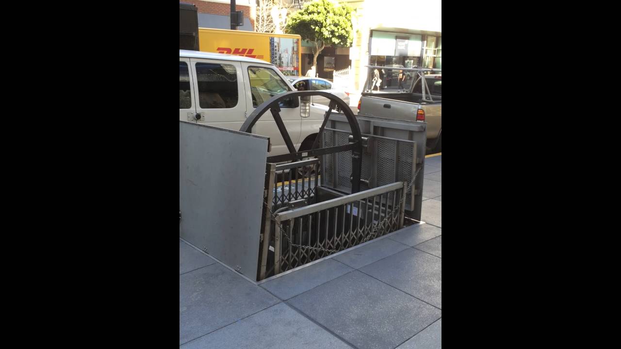 Sidewalk Elevator Shutting Close - Prada NYC - YouTube
