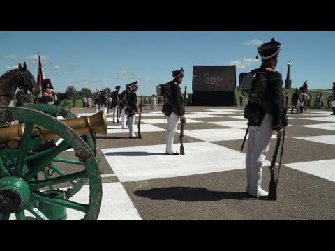 Russia: battle re-enacted on giant human chess board - YouTube