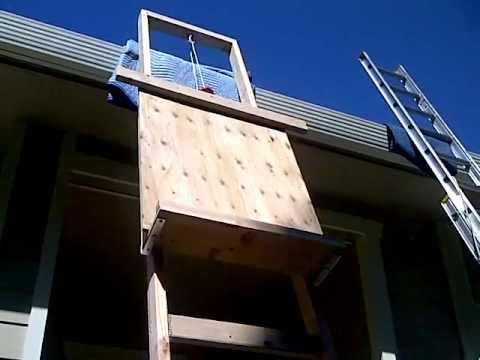 Lifting Solar Panels onto the roof by Complete Solar Solutions - YouTube