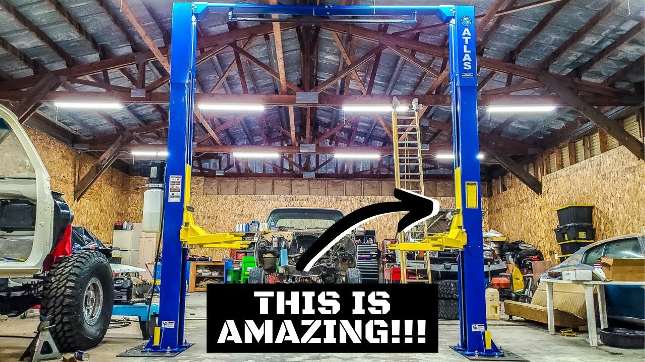 INSTALLING THE CAR LIFT!!! Testing the new car lift and this happened ...