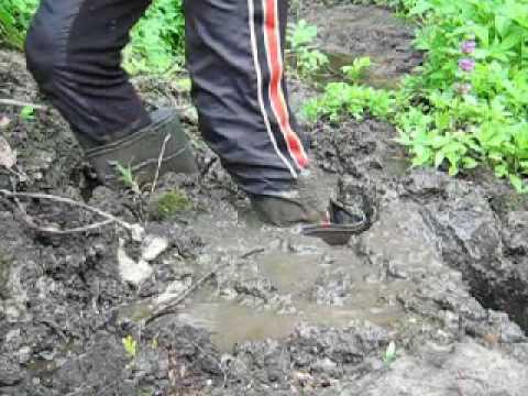 Rubber boots in mud - YouTube