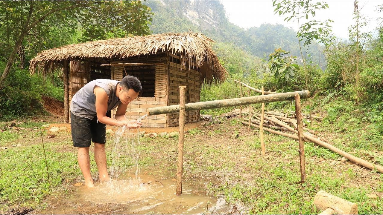 Primitive technology: Irrigation, Water supply by bamboo tube for ...