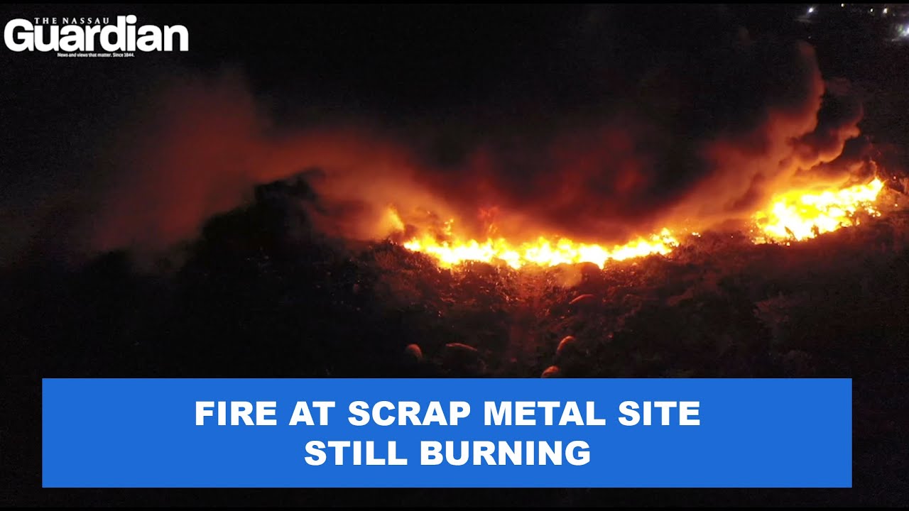Fire at scrap metal site still burning - YouTube