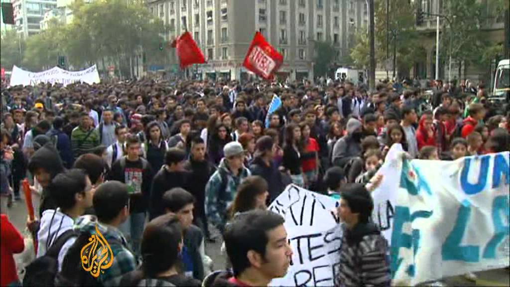 Chile students rally for free education - YouTube