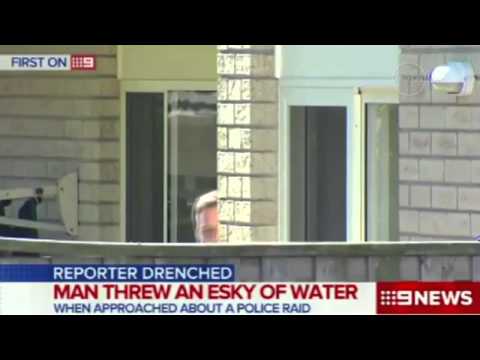Thug throws bucket of water on news anchor - YouTube