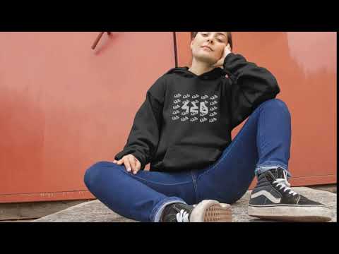 video of a woman sitting down with legs open wearing a pullover hoodie a13116