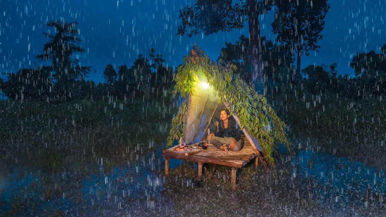 SOLO CAMPING in RAIN Building my Bushcraft Survival Shelter - YouTube