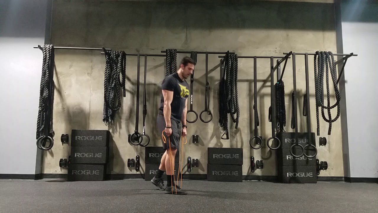 Increased resistance staggered stance band deadlift - YouTube