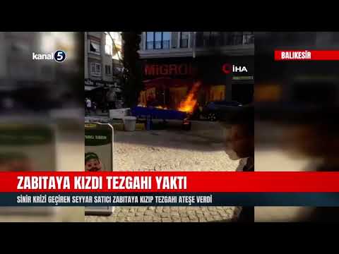 Sinir Krizi Geçiren Seyyar Satıcı Zabıtaya Kızıp Tezgahı Ateşe Verdi