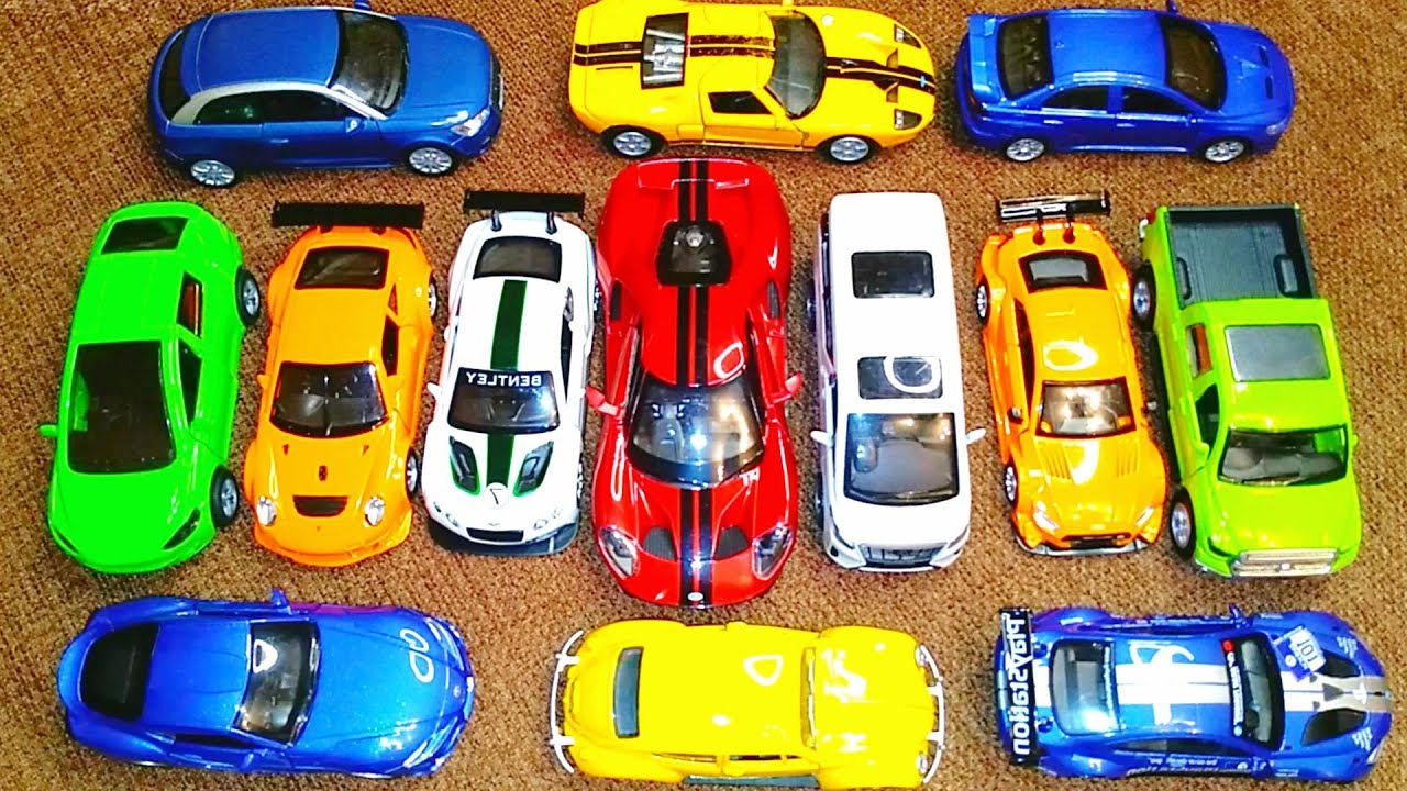Bright colored small cars from a big box - YouTube