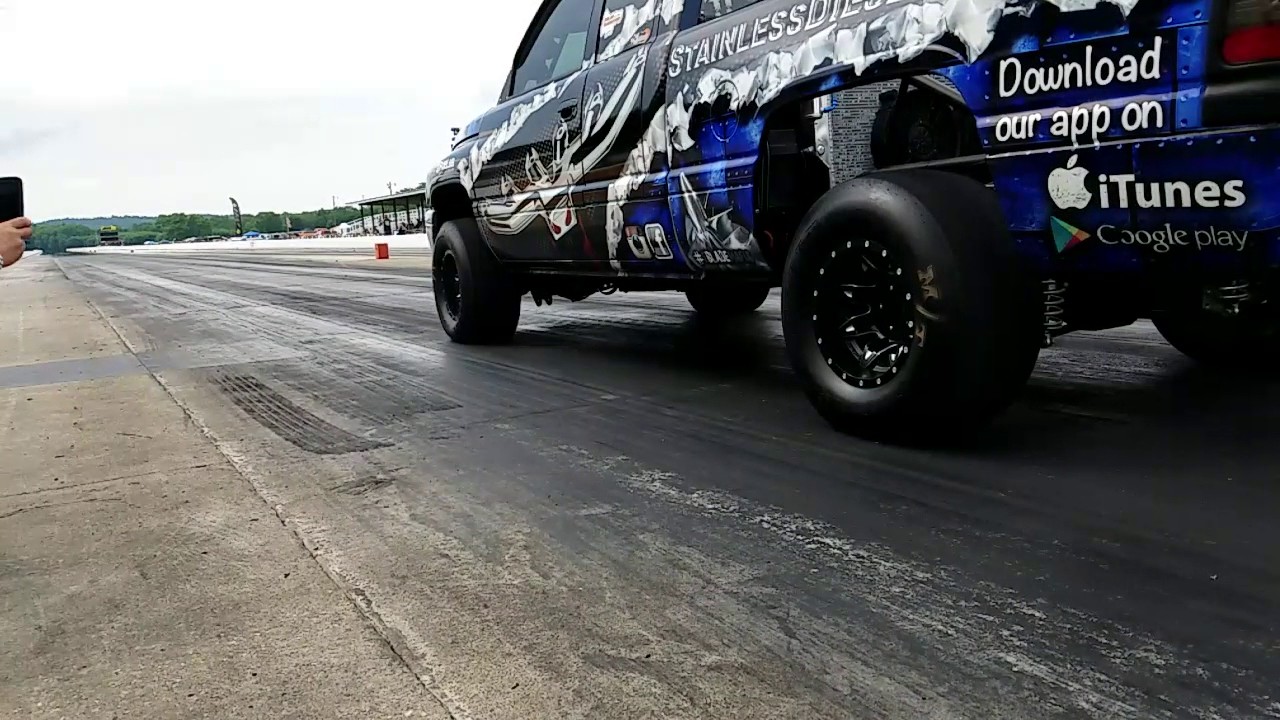 4 wheel drive, wadded tire, diesel drag racing hard slow motion launch ...
