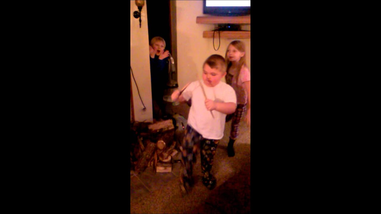 Strong kid breaking stick on his knee - YouTube