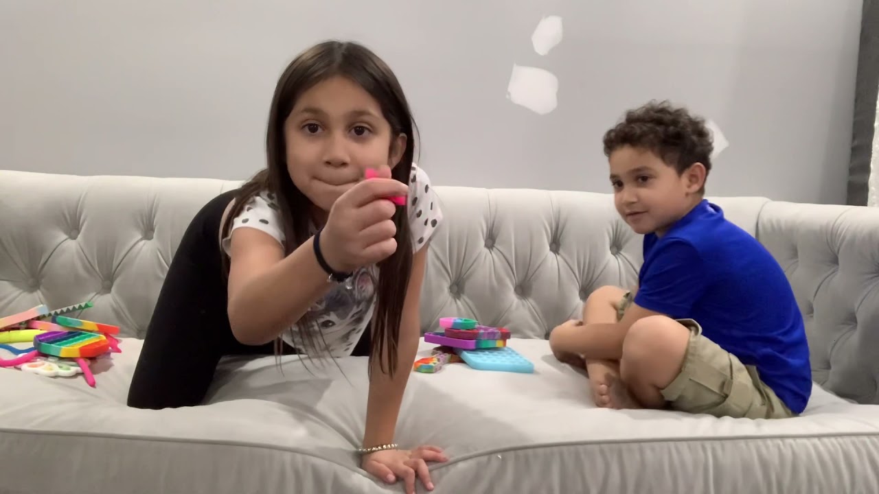 Playing fidget trading with my little brother - YouTube