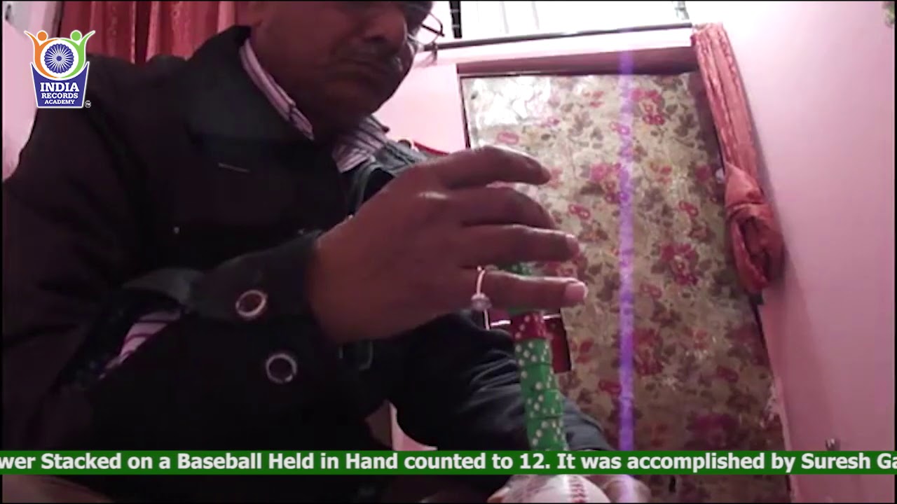 Tallest Dice Tower Stacked on a Baseball Held in Hand - 20153133 - YouTube