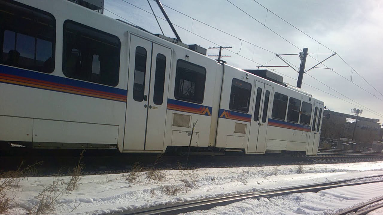 Drumbeat of many RTD trains at Ellsworth Ave. crossing in Denver ...