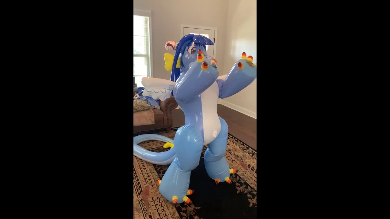 A customer testing their Dutch Angel Dragon inflatable pvc suit - YouTube