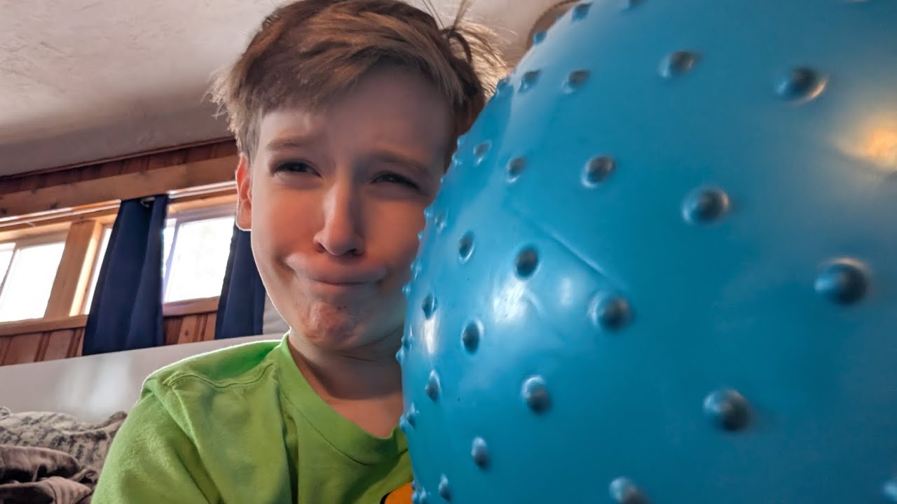 Smacking my face with a spikey ball, I don't know why. - YouTube