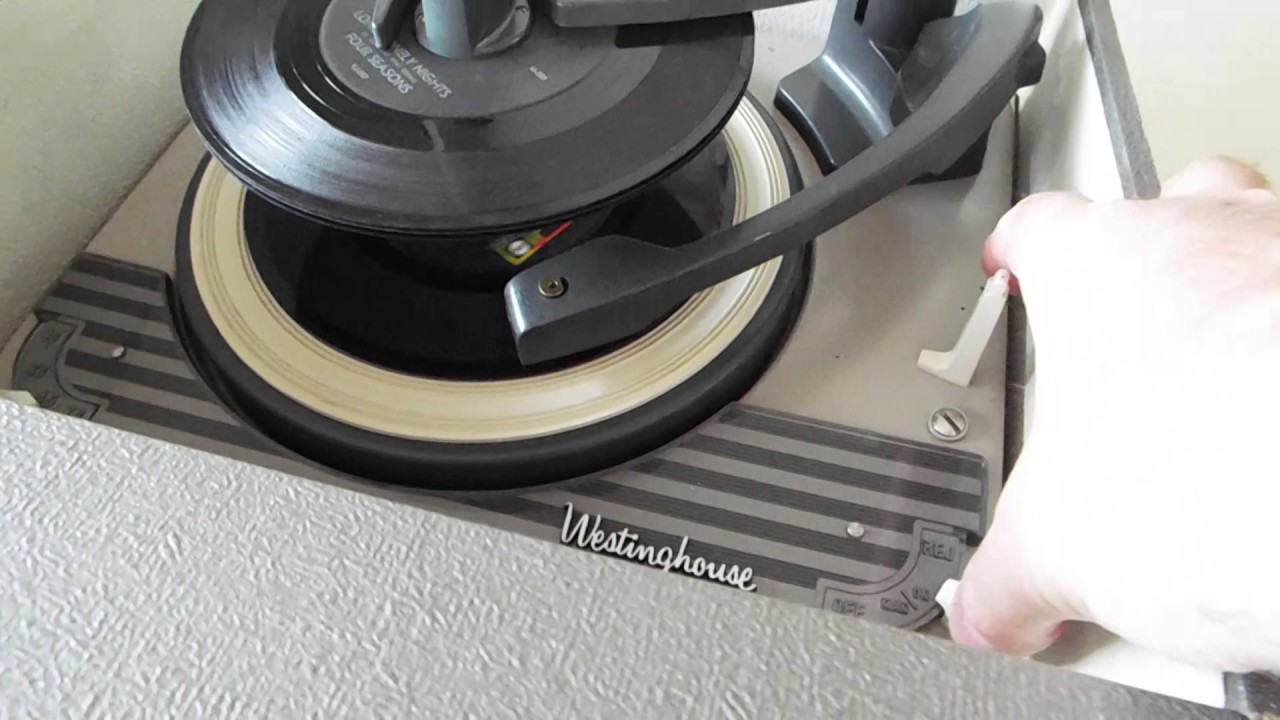 WESTINGHOUSE record player playing a stack of 45 RPM records. - YouTube