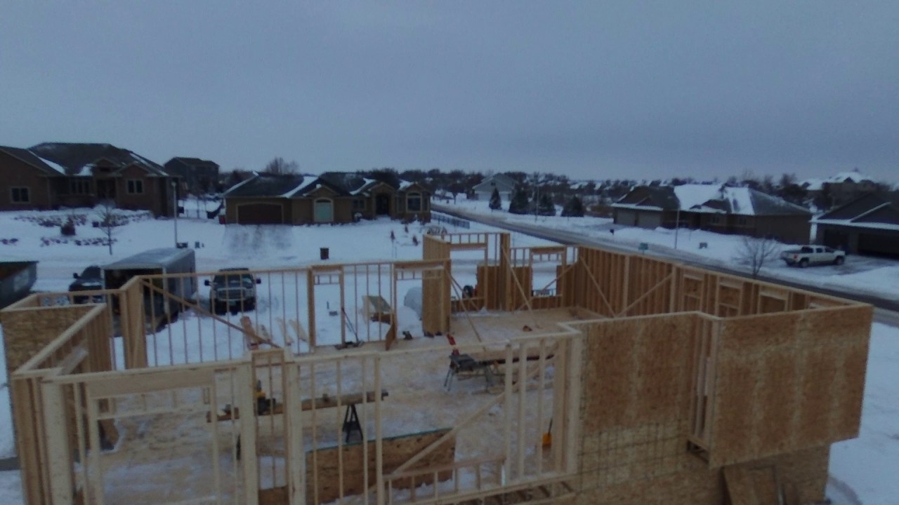 Bitterroot progress exterior walls up and being sheeted flyover - YouTube