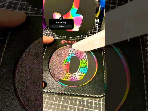 After clean glitter - Letter D appears on scratch paper #rainbowscratch #scratchbook #letterD #diy