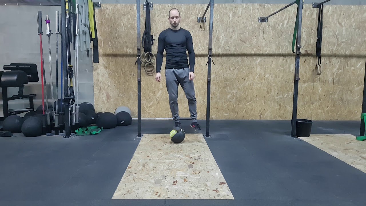 One leg balance on medicine ball - YouTube