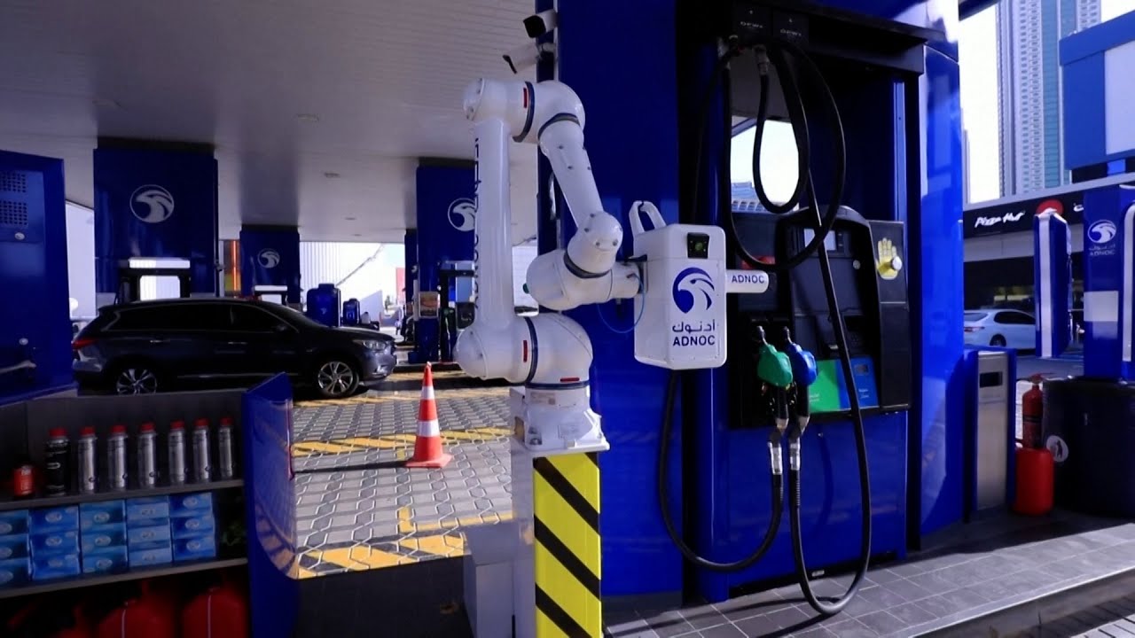 Robots at the gas station? UAE launches an AI-powered fueling arm - YouTube