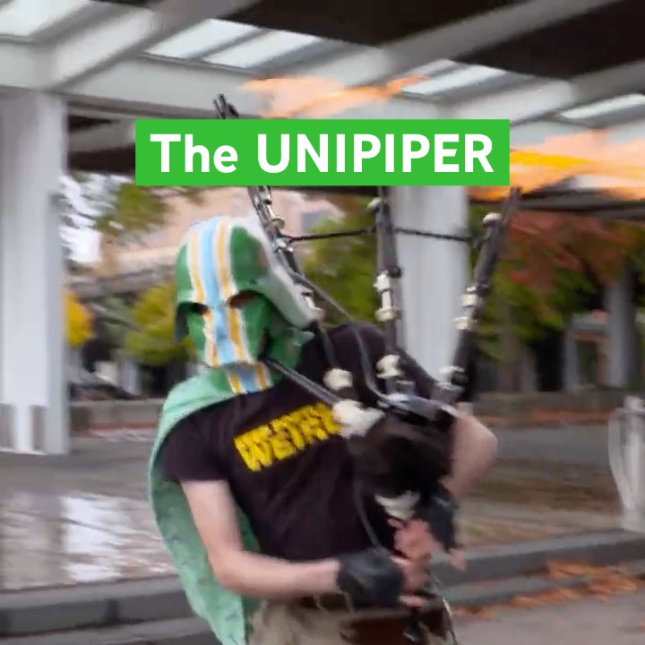 UNIPIPER Brian Kidd demonstrates his fire-breathing bagpipes. Keeping ...