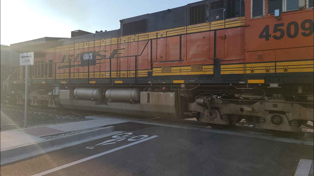 EX-BNSF Leaser Unit With Swoosh Logo Trails on Empty Grainer - YouTube