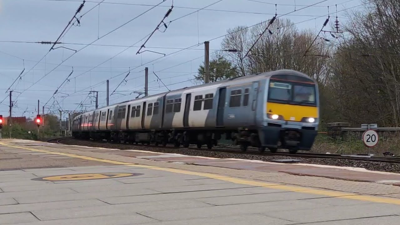 Varamis rail Class 321s at speed through Lancaster! - YouTube