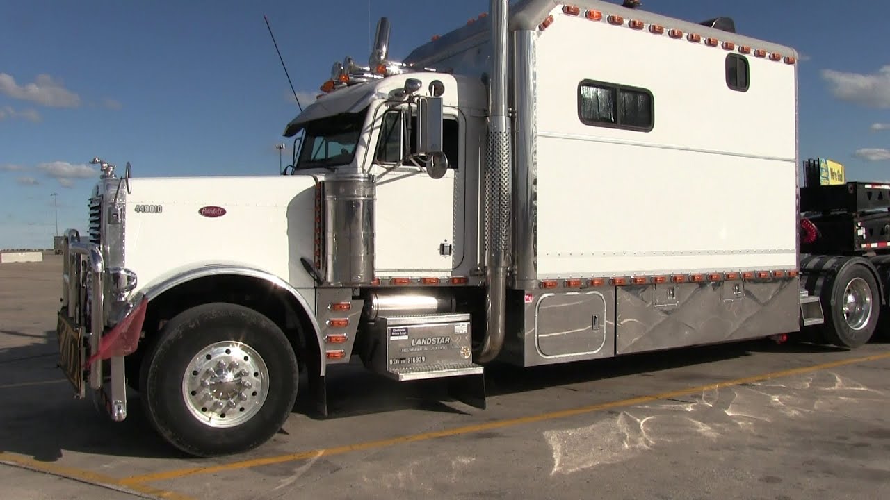 White Peterbilt With Super Sleeper Pulling In At Iowa 80 Truck Stop ...