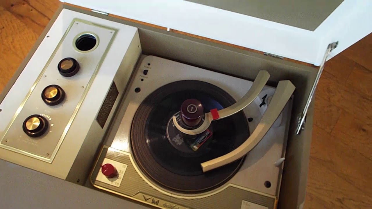 Voice of Music Consolette record player playing a few 45's. - YouTube