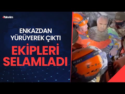 Enkazdan 50 saat sonra yürüyerek çıktı...Yaşlı adam ekipleri böyle selamladı